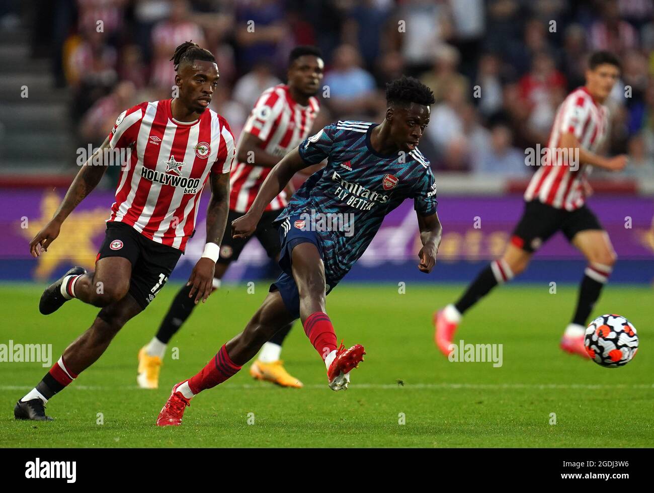 Brentford's Ivan Toney (left) and Arsenal's Albert Sambi Lokonga in ...