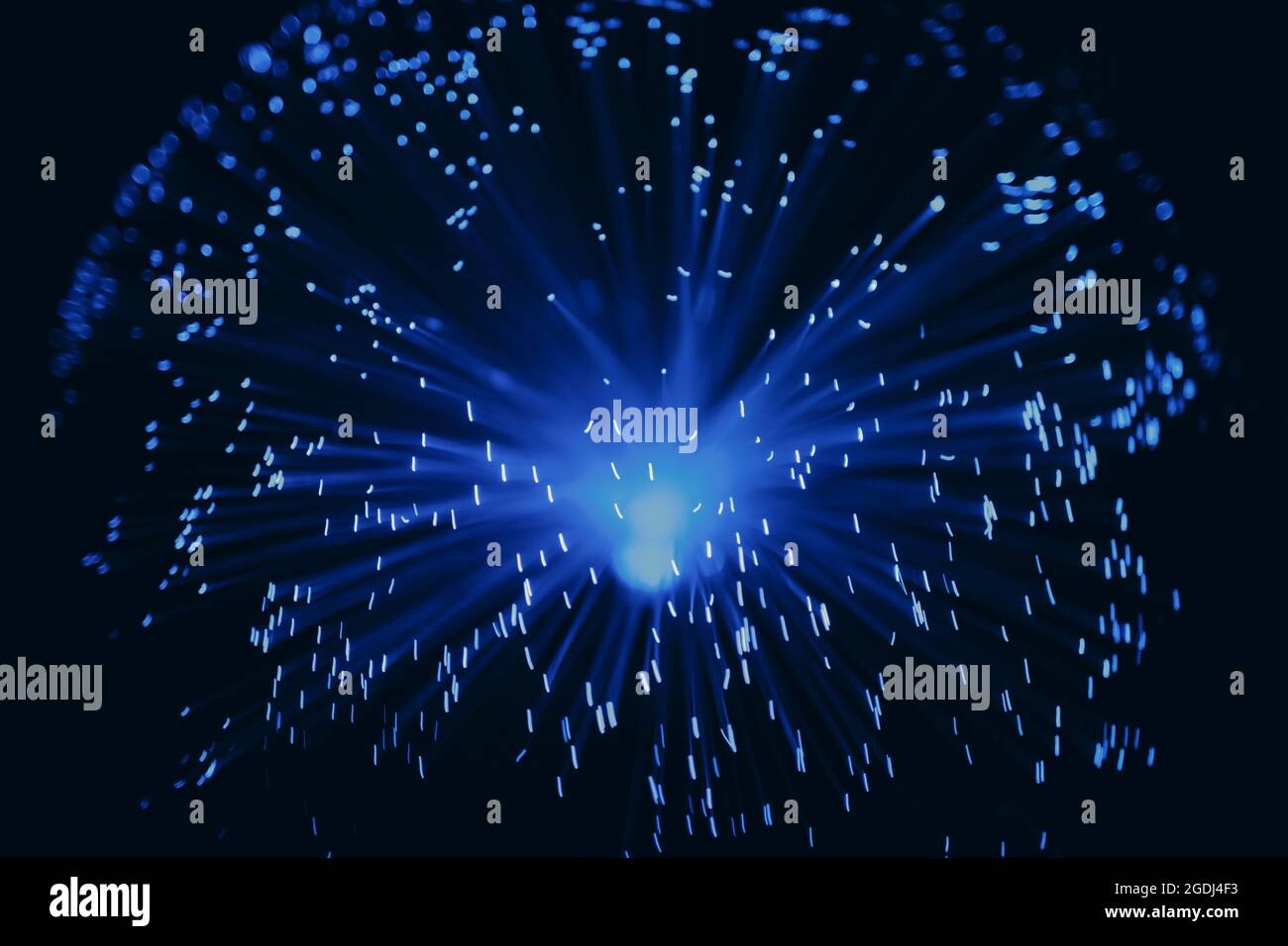 Blue abstract particles and lines with bokeh and blur in dark ...