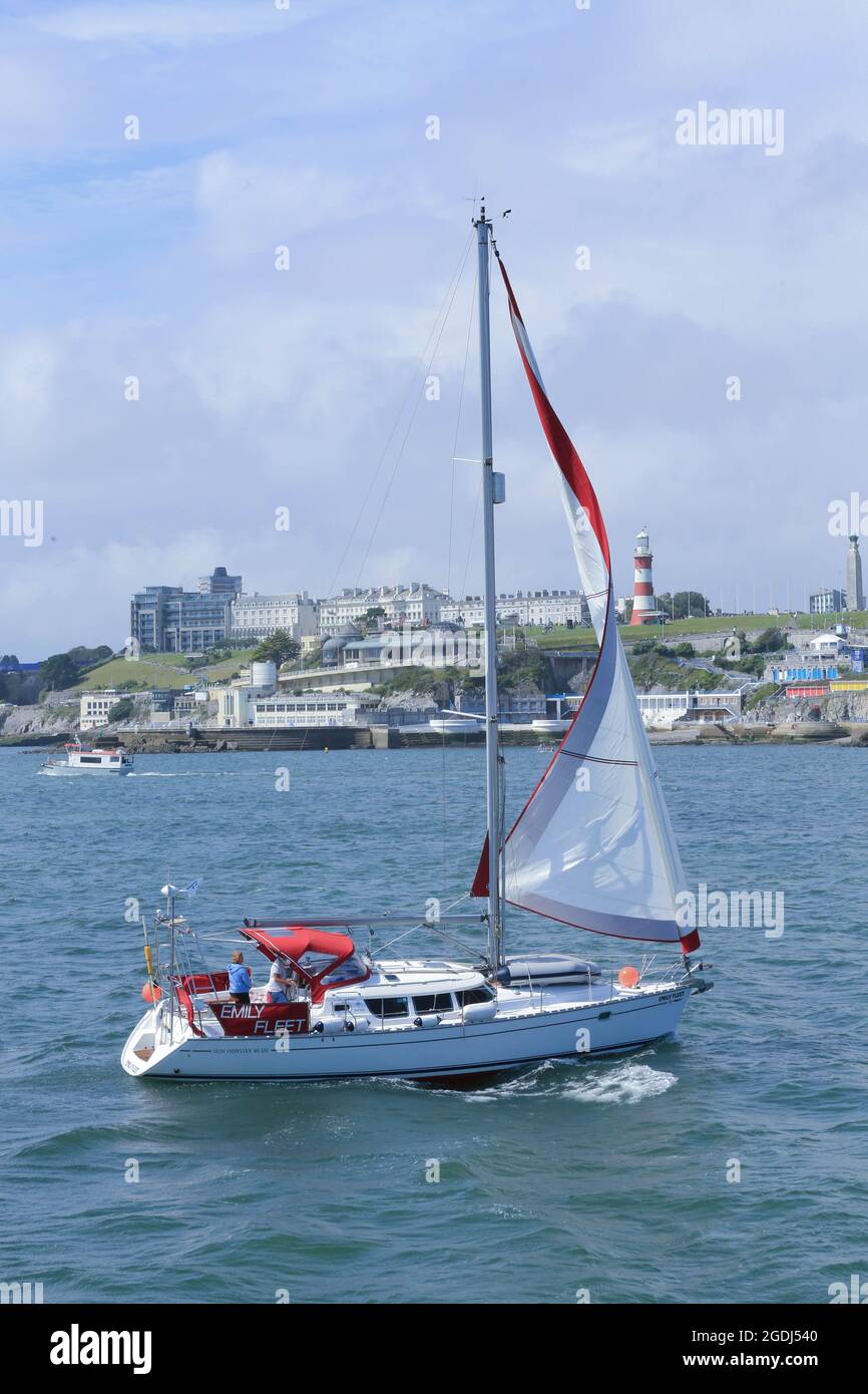 Sailing yacht under sail passing Plymouth Sound Stock Photo - Alamy