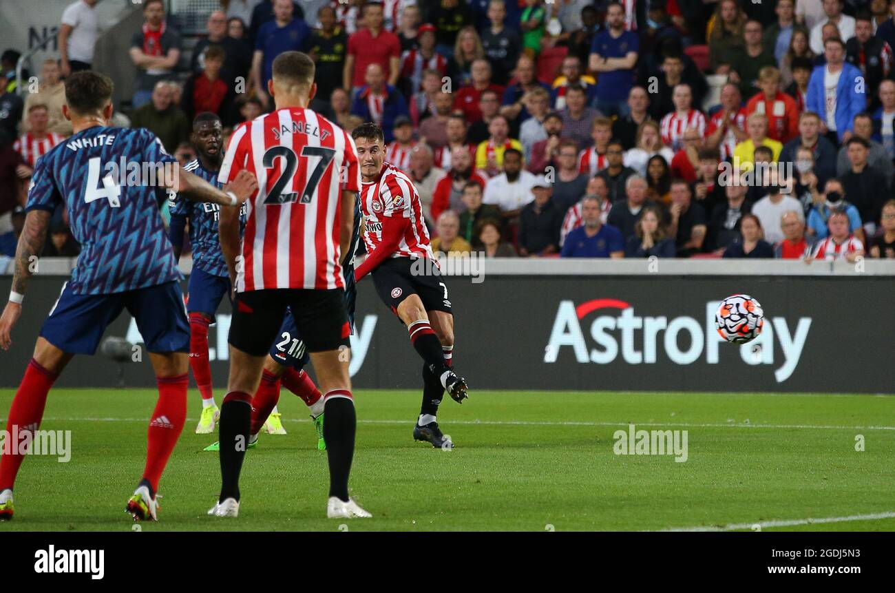 London, UK, 13th August 2021. Sergi Canos of Brentford scores the first ...