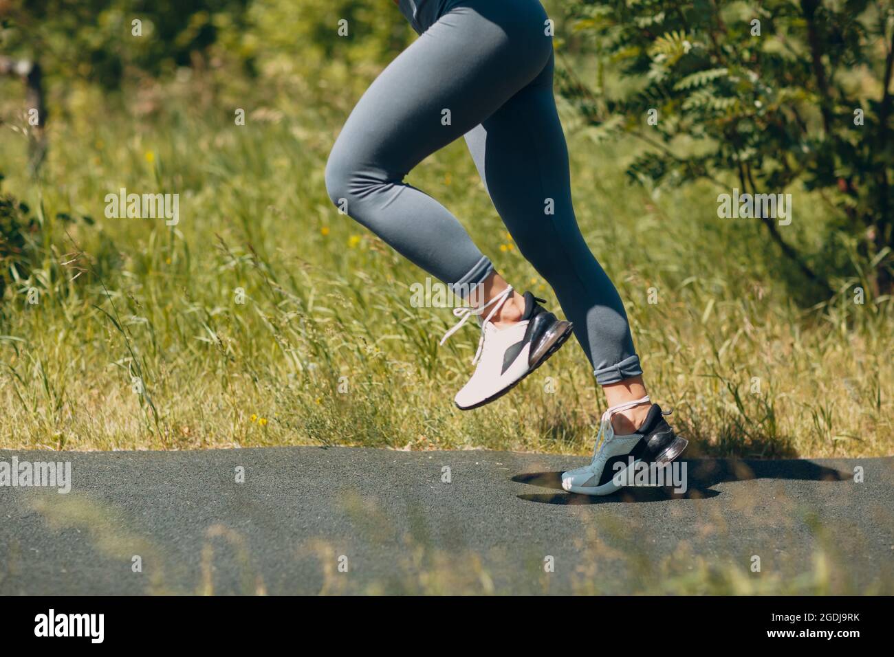 Female running legs marathon hi-res stock photography and images - Alamy