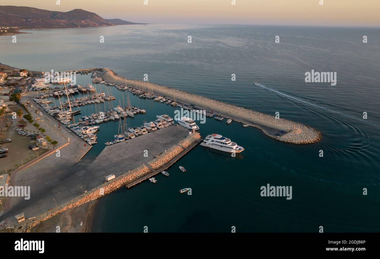 Aerial view of fishing boats and tourist yachts moored at the marina ...
