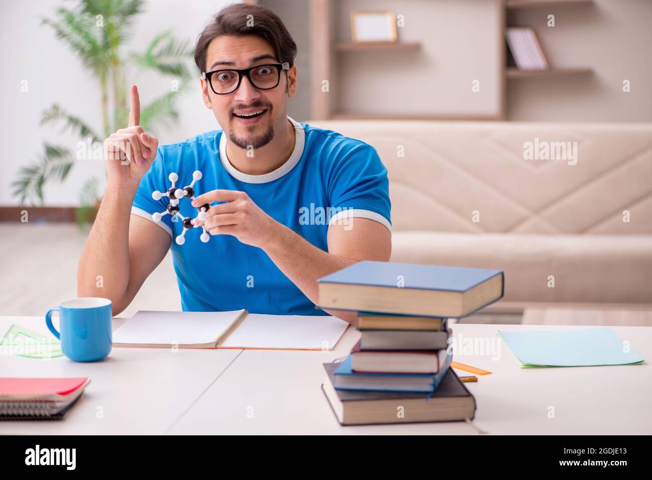 Young student physicist studying molecular model Stock Photo - Alamy