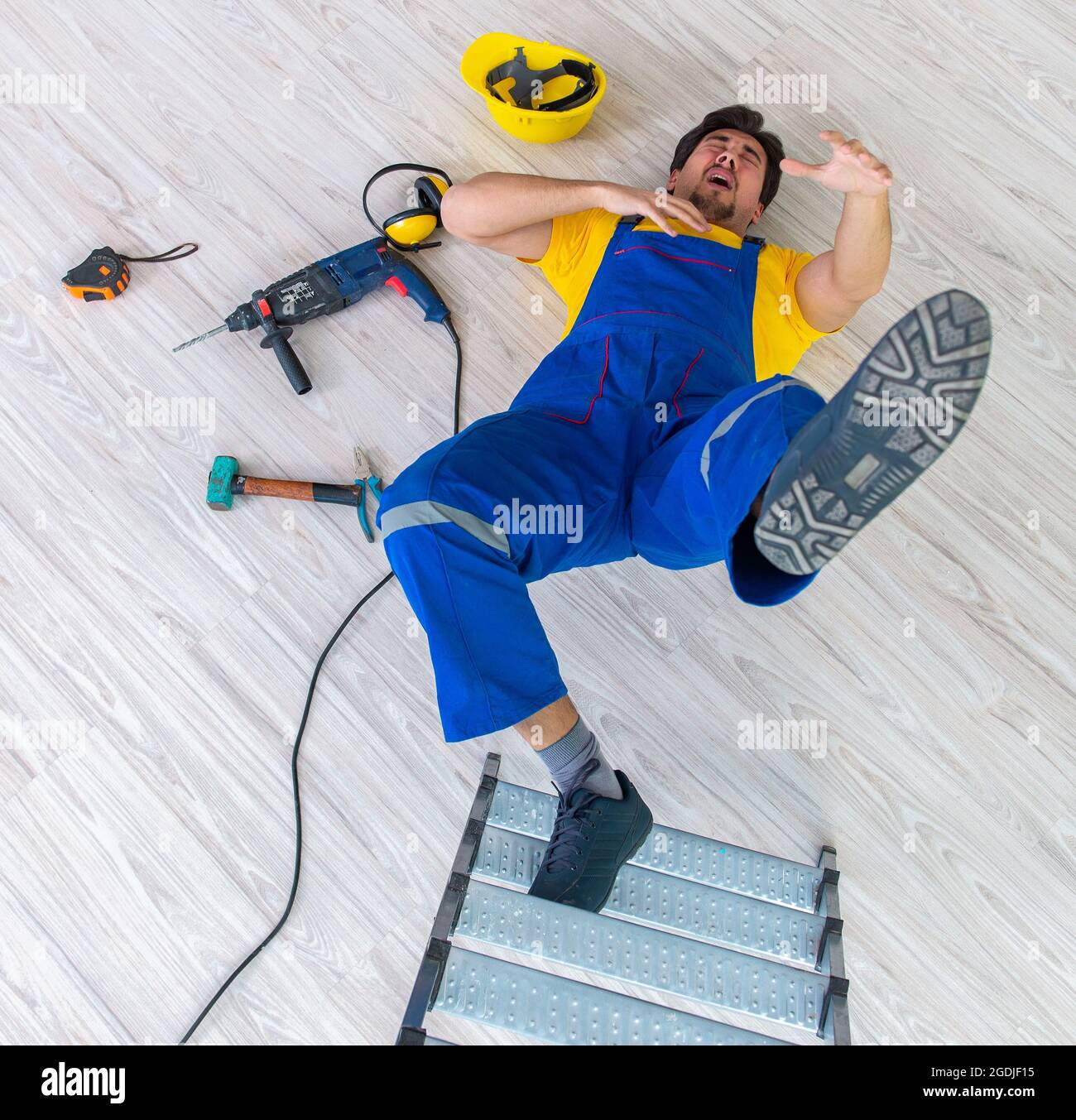The injured worker at the work site Stock Photo - Alamy