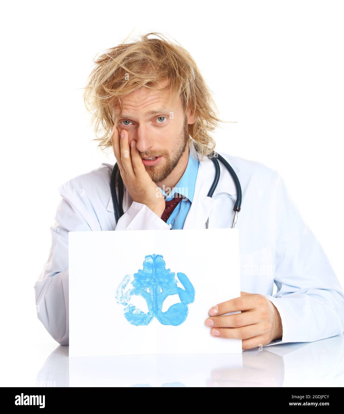 Funny psychotherapist holding Rorschach test Stock Photo - Alamy