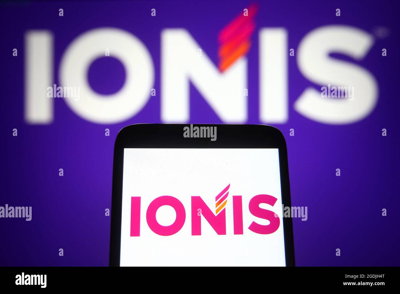 In this photo illustration a Ionis Pharmaceuticals logo of a ...