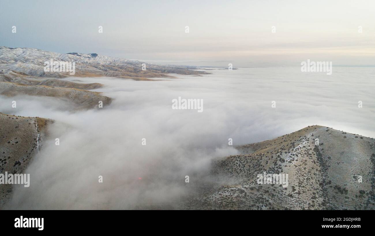 Poking out of mist hi-res stock photography and images - Alamy