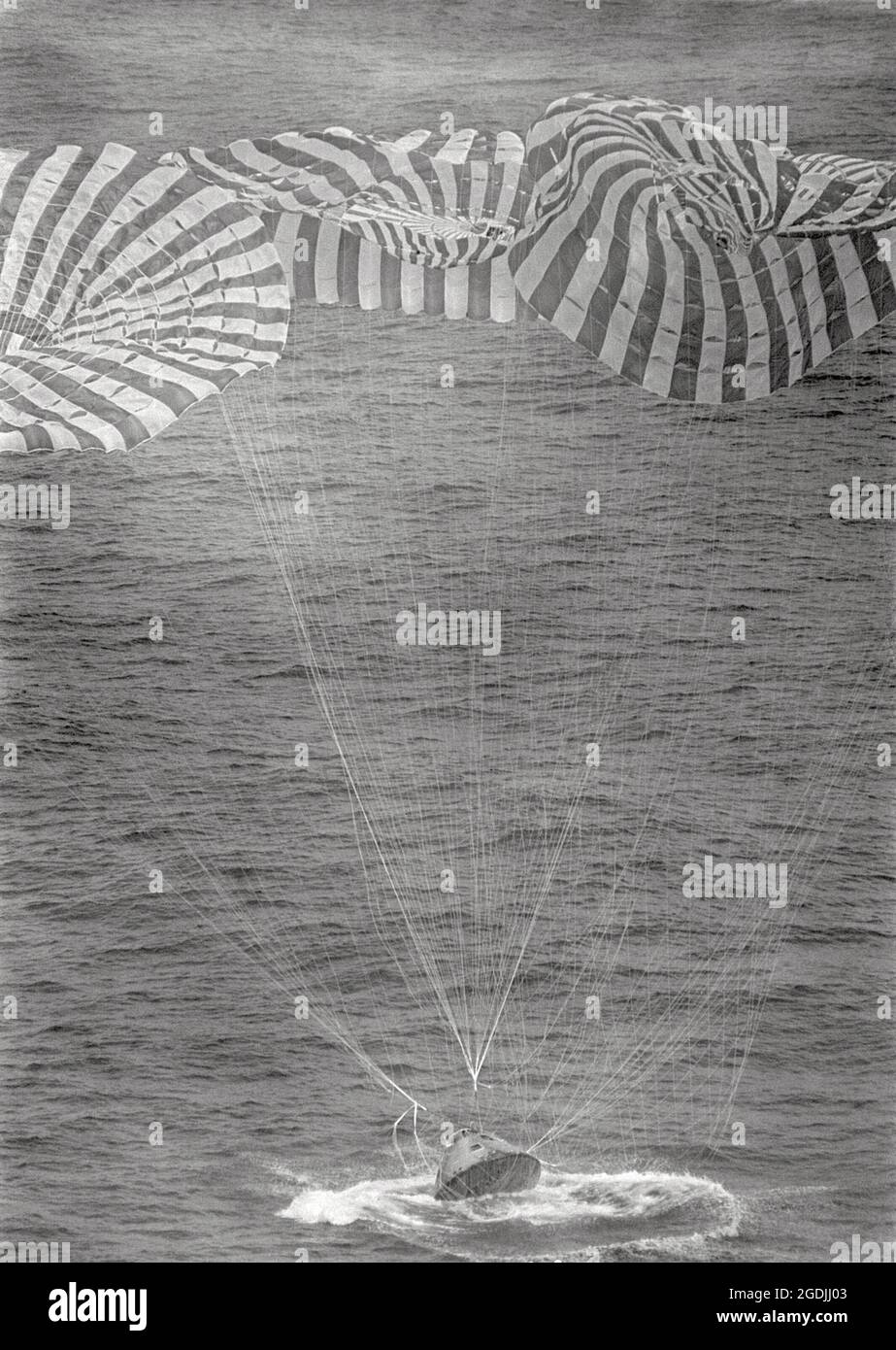The Apollo 9 Command Module "Gumdrop", splashes down in the Atlantic ...