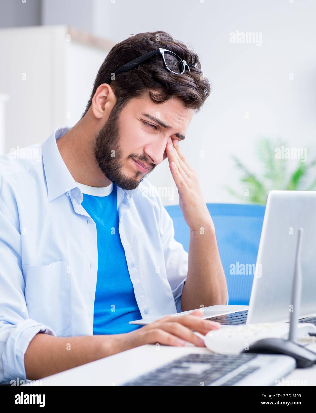 The frustrated young man due to weak internet reception Stock Photo - Alamy