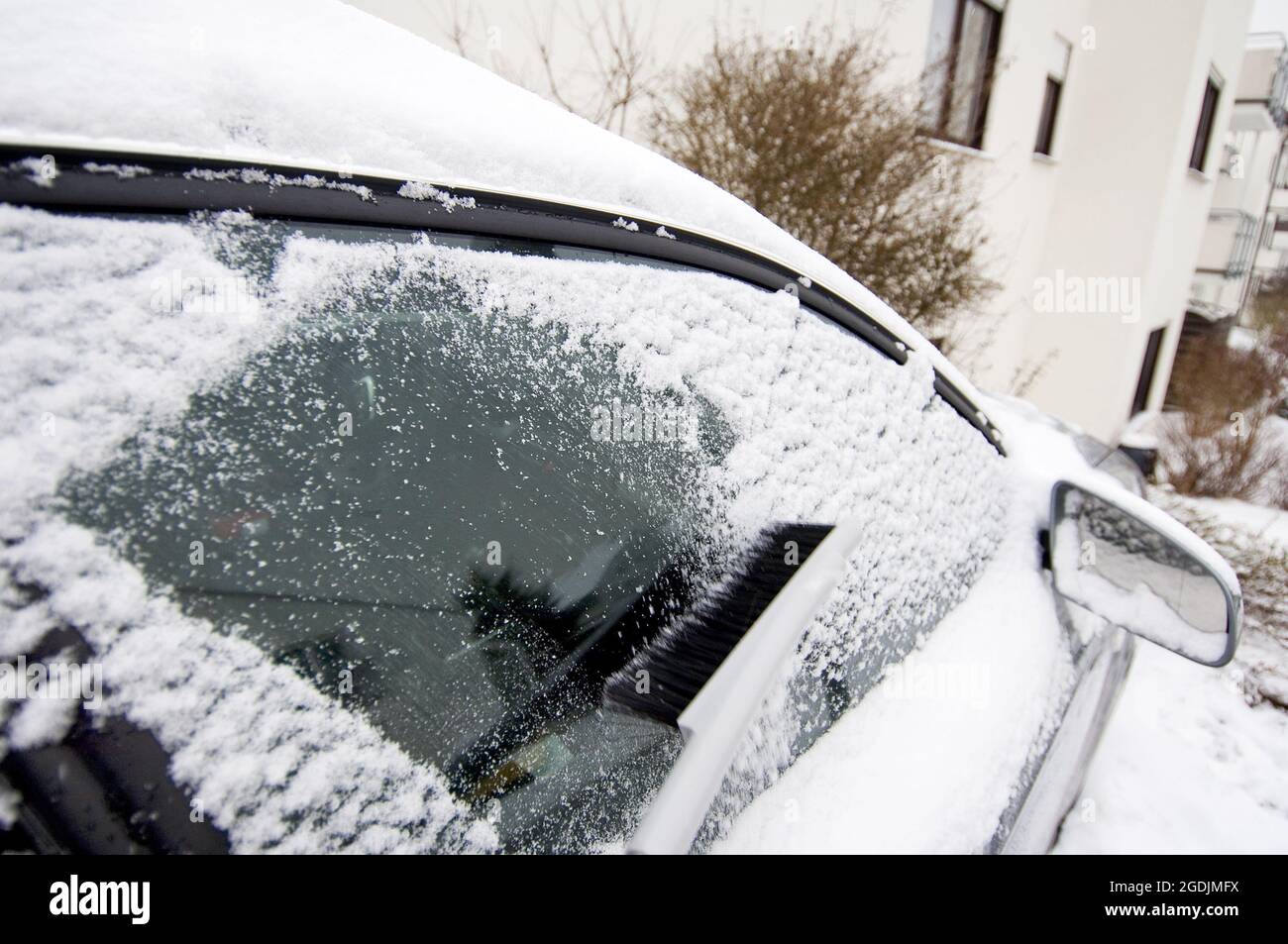 removing snow from the car window , Germany Stock Photo - Alamy
