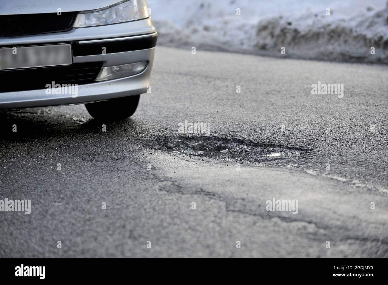 Road with potholes hi-res stock photography and images - Alamy