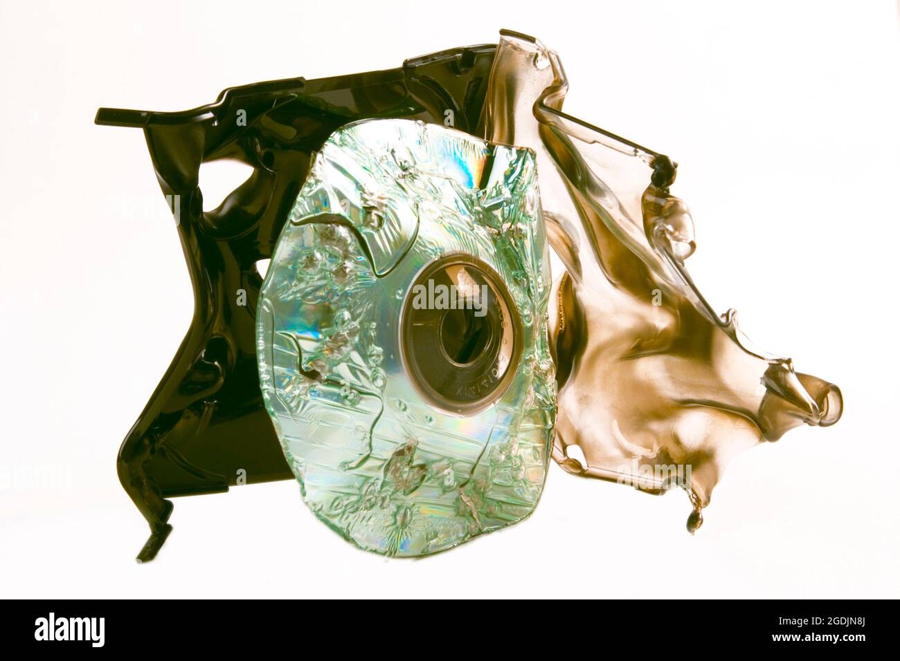 loss of data, melted CD with CD cover Stock Photo - Alamy