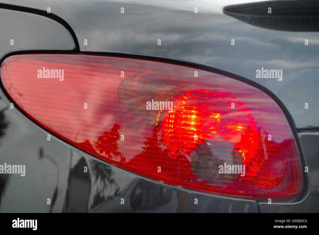 Car stopping at red light hi-res stock photography and images - Alamy