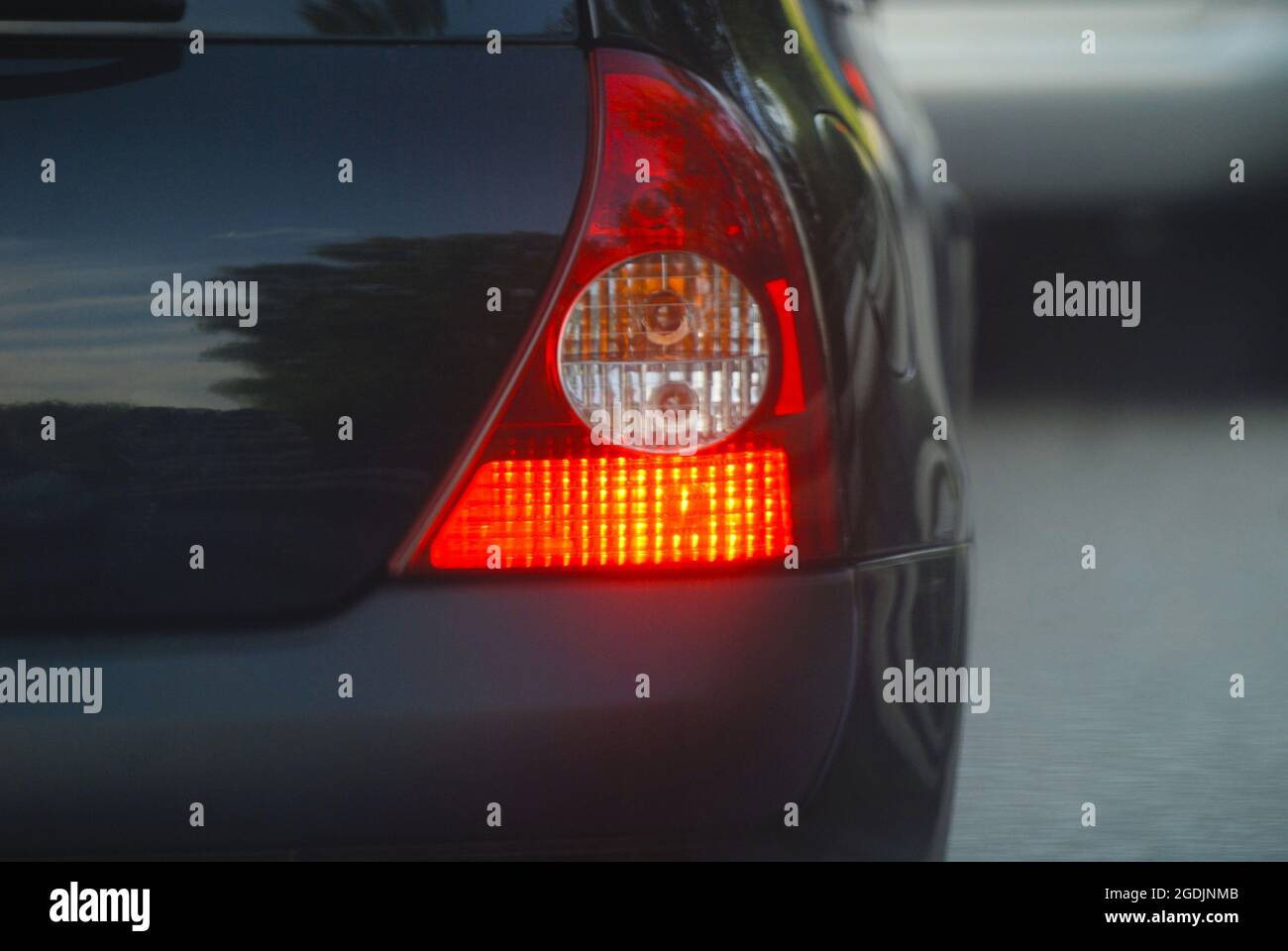 Car stopping at red light hi-res stock photography and images - Alamy