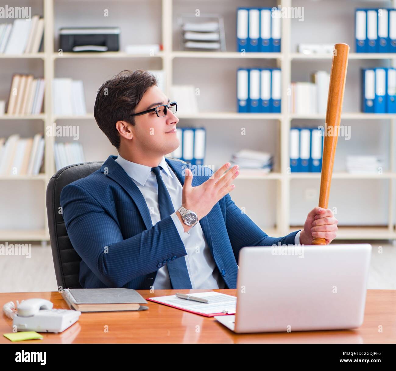 The angry aggressive businessman in the office Stock Photo - Alamy