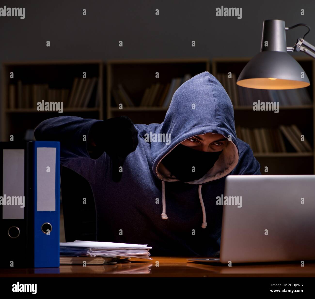 The hacker stealing personal data from home computer Stock Photo - Alamy