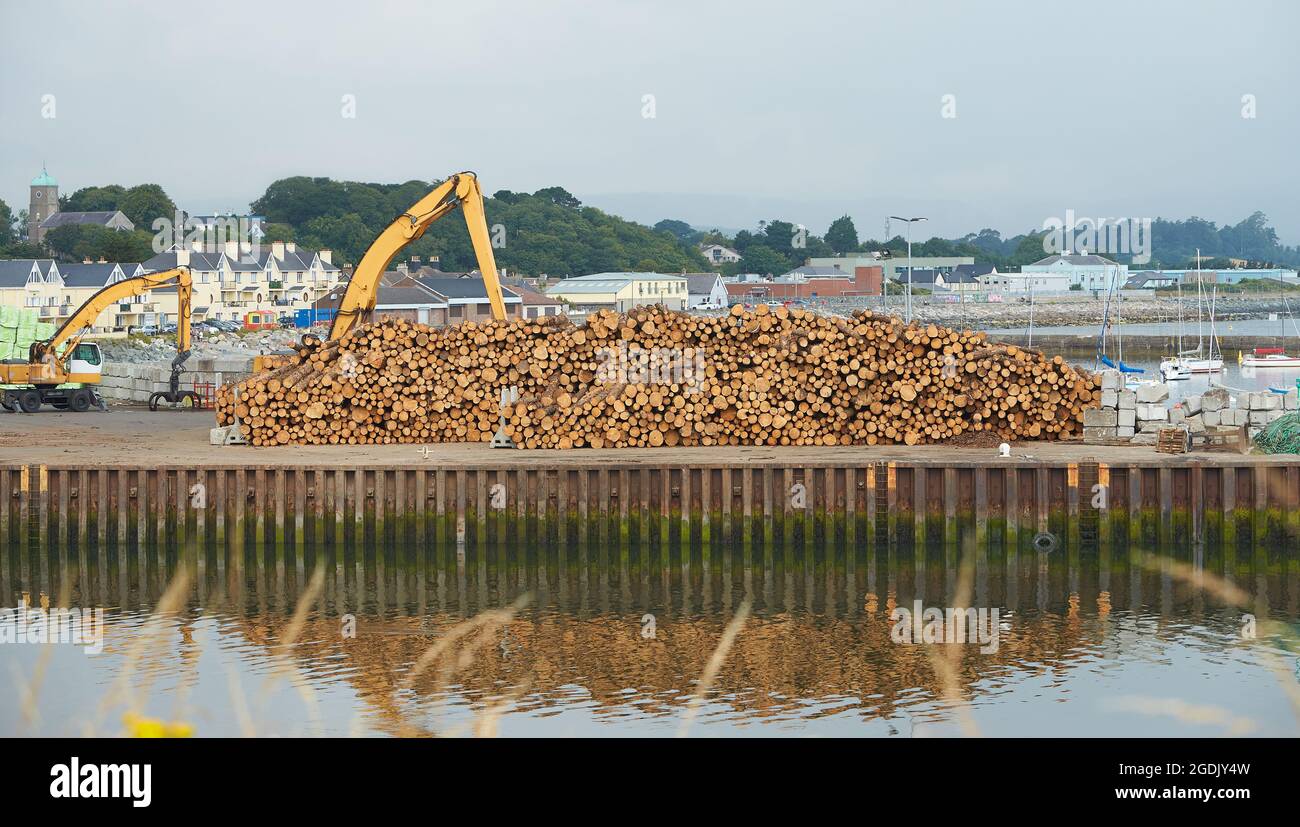 Timber export or import, loading on cargo ship in Wicklow commercial ...