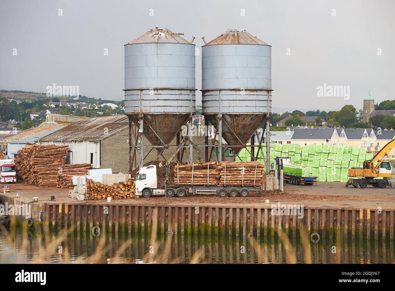 Timber export or import, loading on cargo ship in Wicklow commercial ...