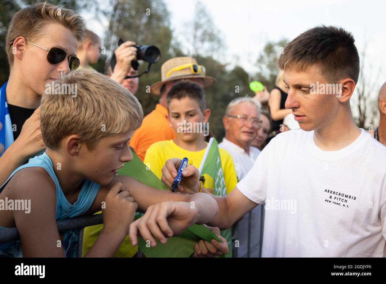 Two-time Tour de France winner Tadej Pogacar signs autographs at a ...