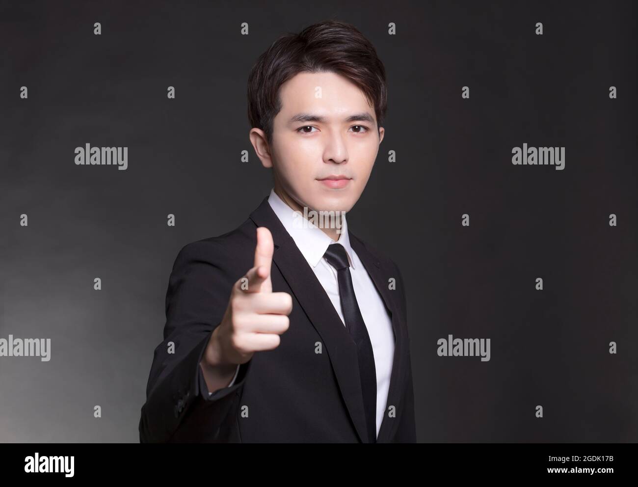 Asian man pointing finger hi-res stock photography and images - Alamy