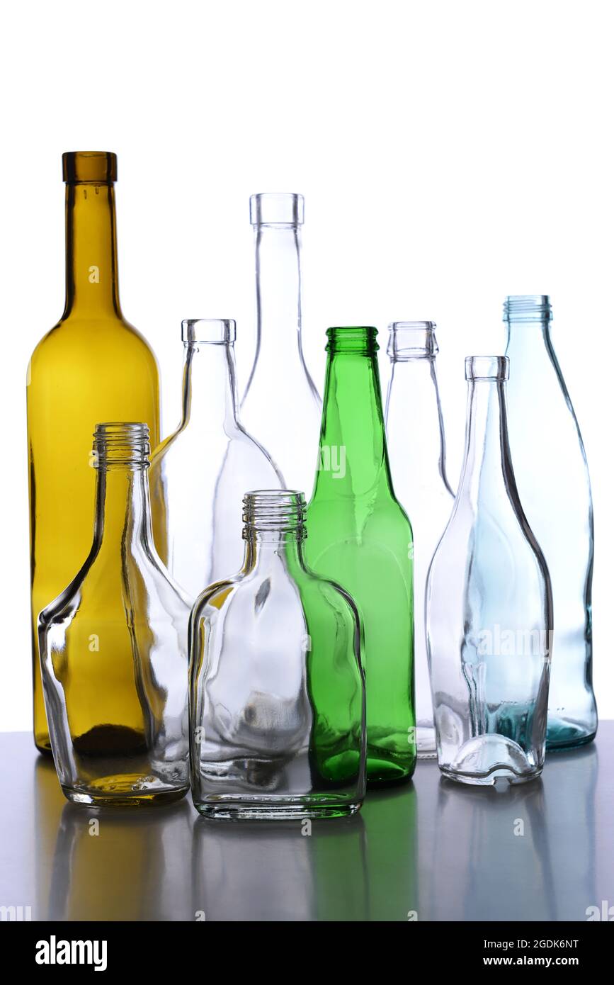 Empty glass bottles isolated on white Stock Photo - Alamy