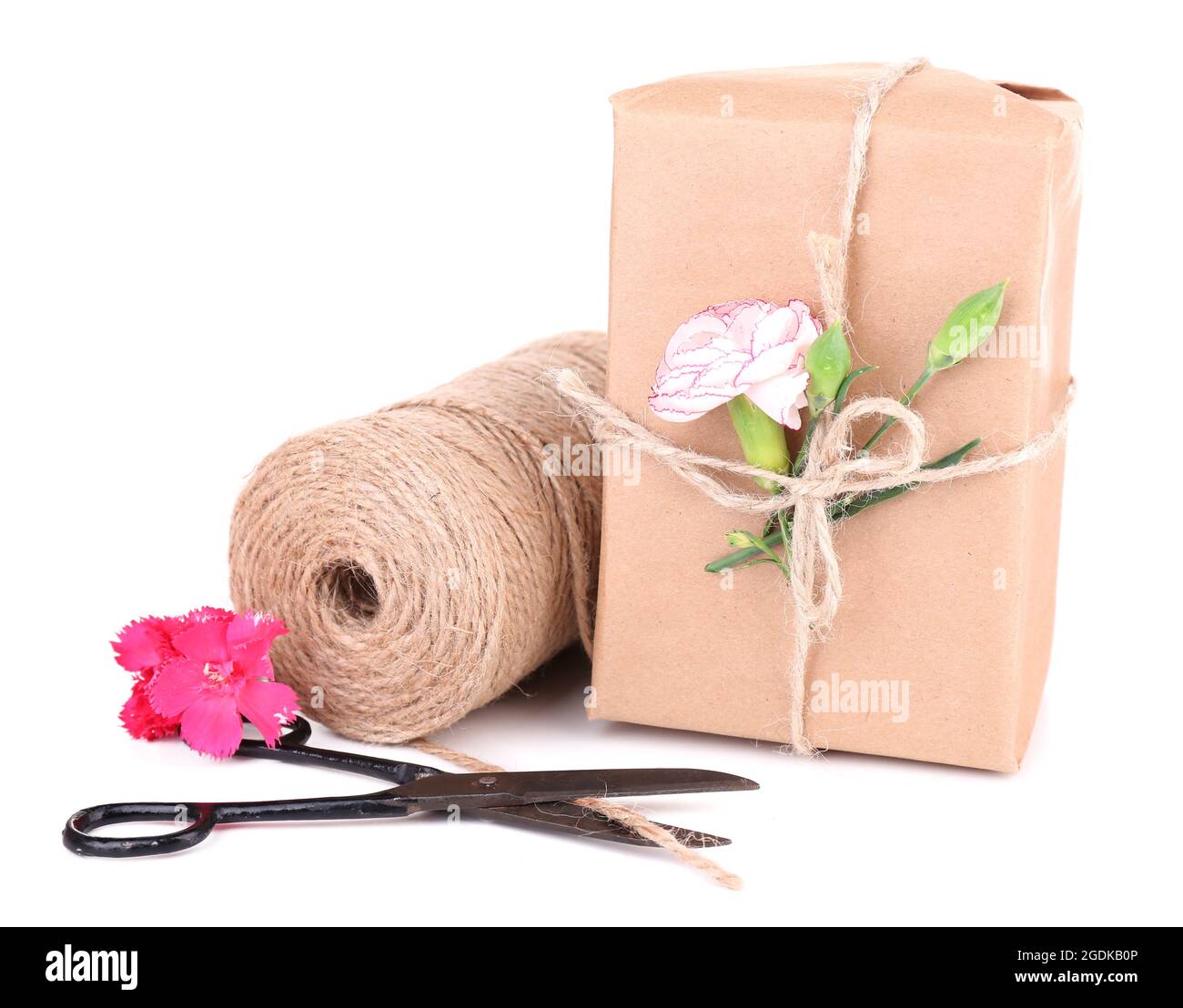 Beautiful gift with flowers and decorative rope, isolated on white ...