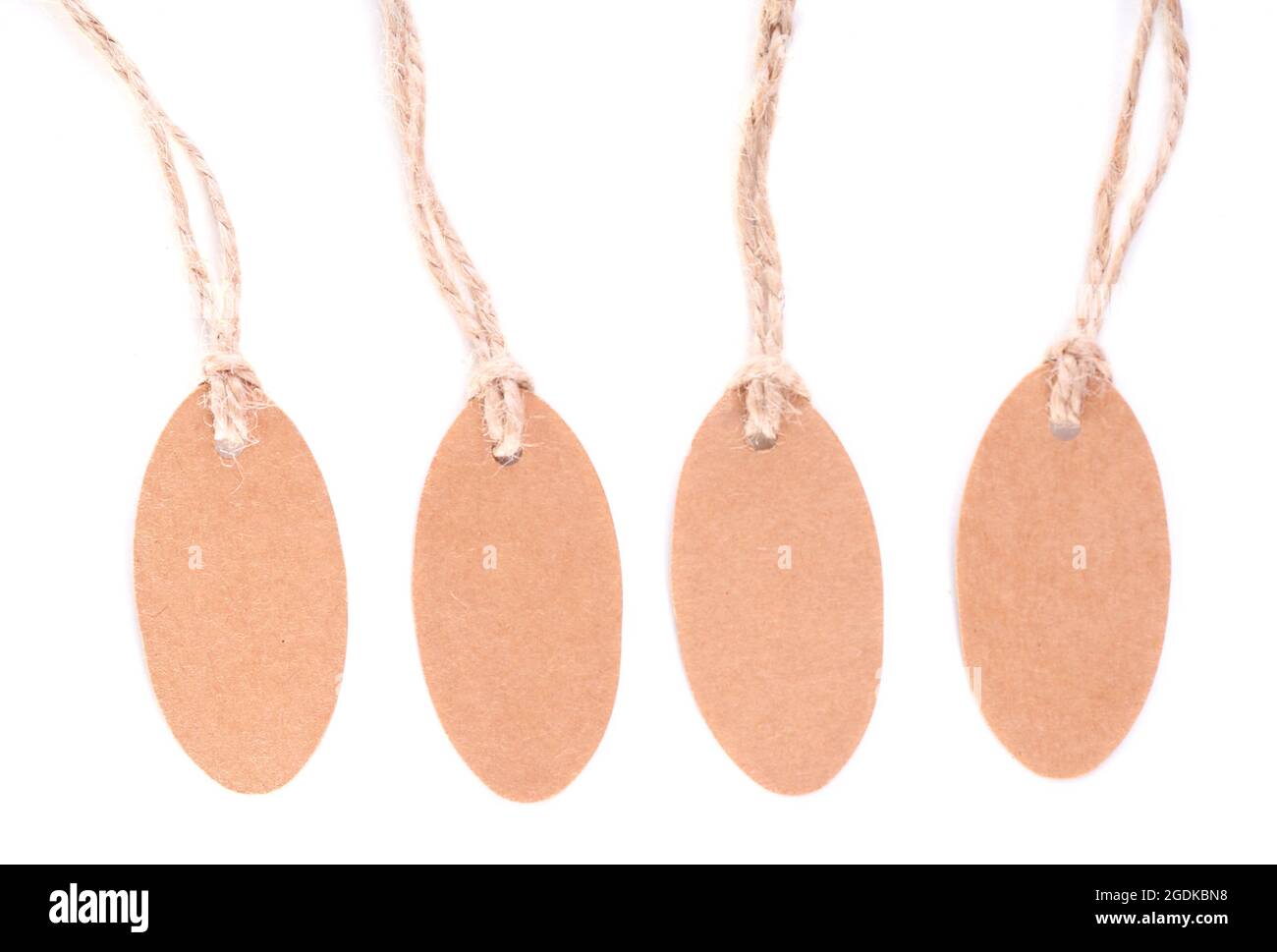 Brown tags isolated on white Stock Photo - Alamy