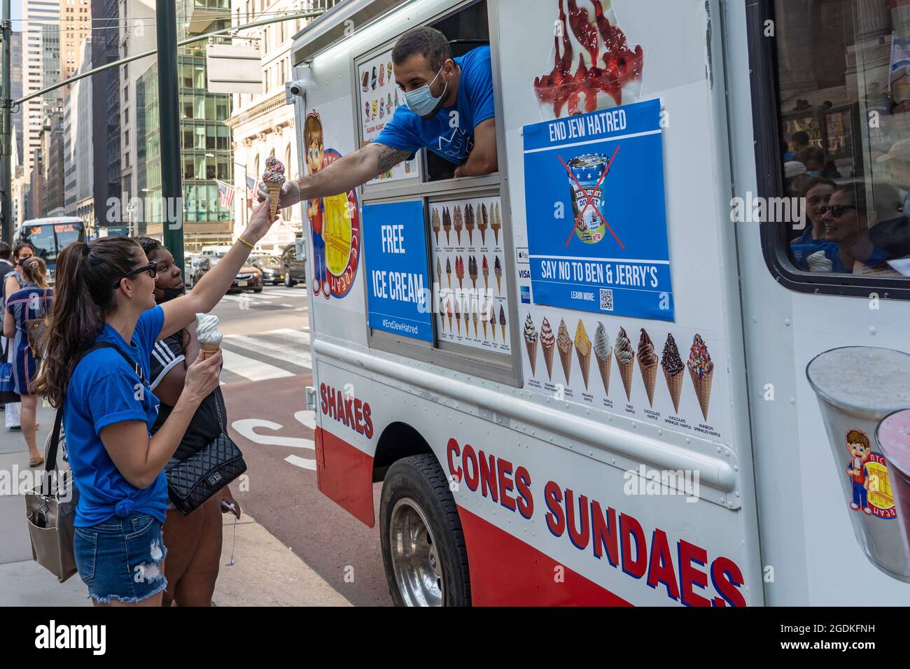 Protester gets free ice cream at the end of the rally.Protesters staged ...