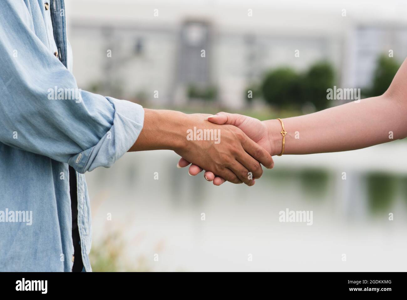 Friends hand shake hi-res stock photography and images - Alamy
