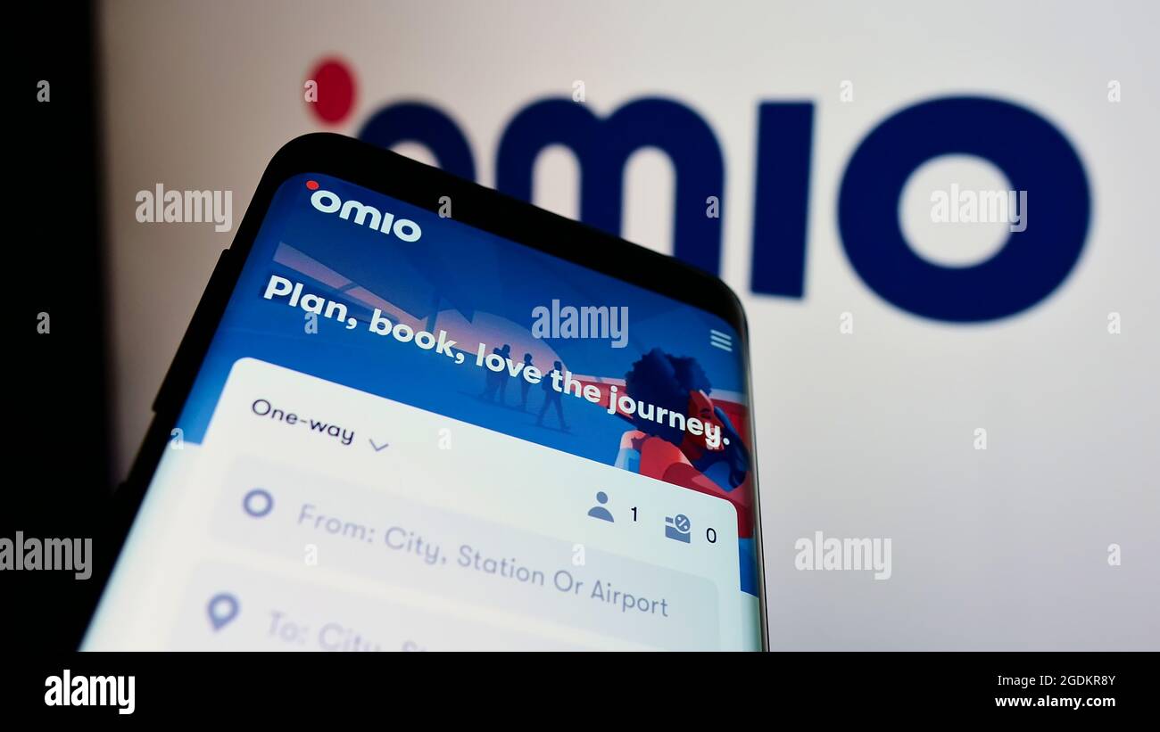 Cellphone with webpage of German travel company GoEuro Corp. (Omio) on ...