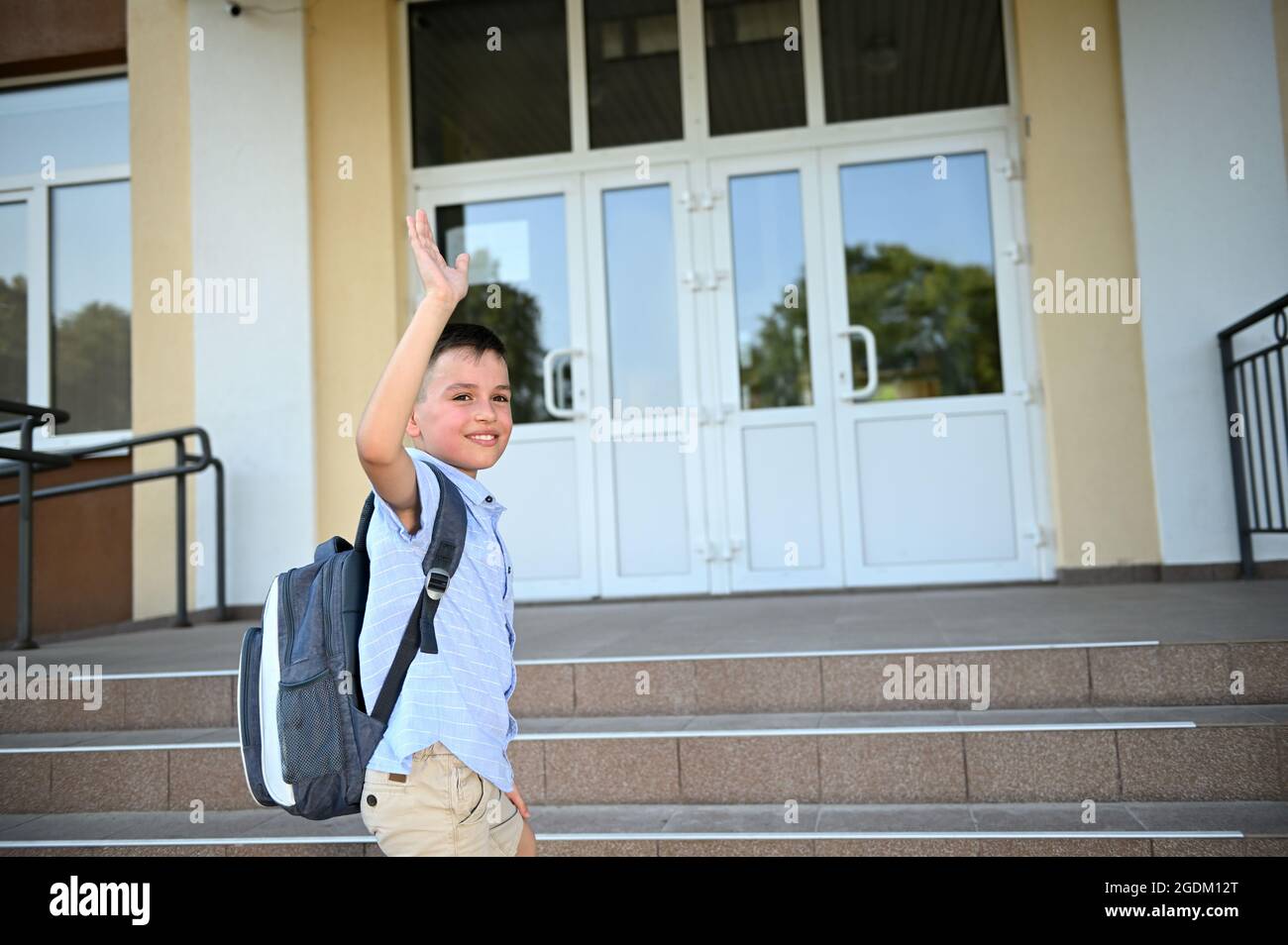 Kids Waving Goodbye At School