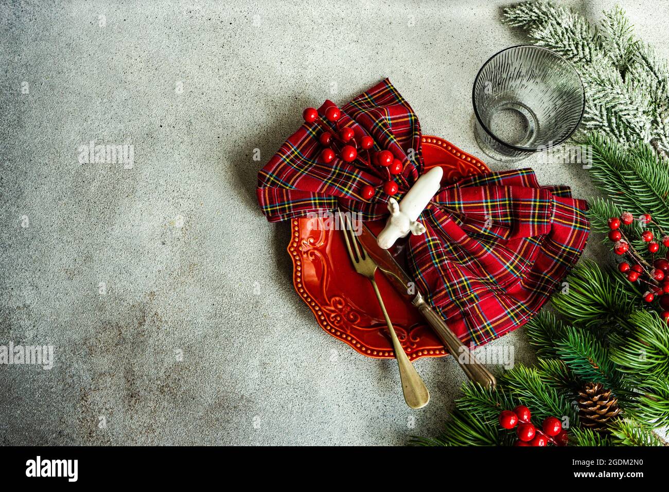 Table setting for festive Christmas dinner on concrete table Stock ...