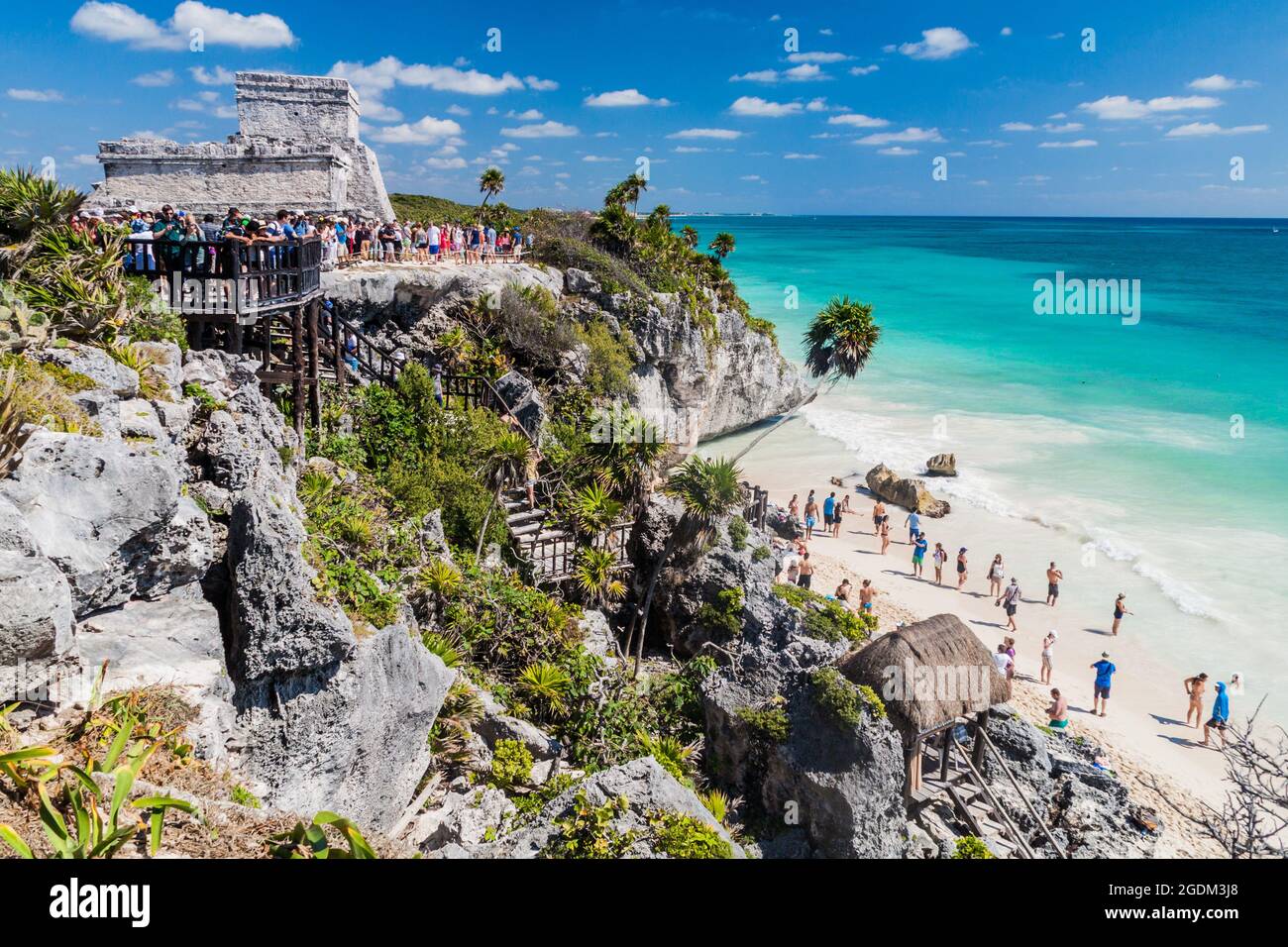 TULUM, MEXIO - FEB 29, 2016: Tourists at the beach under the ruins of ...