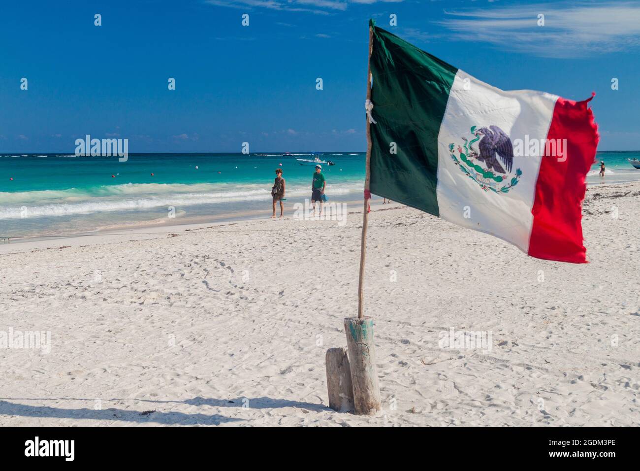 TULUM, MEXIO - FEB 29, 2016: Mexican flag at the Caribbean beach in ...