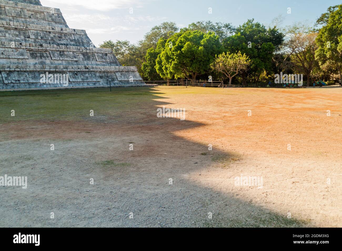 Early morning shadow of the pyramid Kukulkan in the Mayan archeological ...