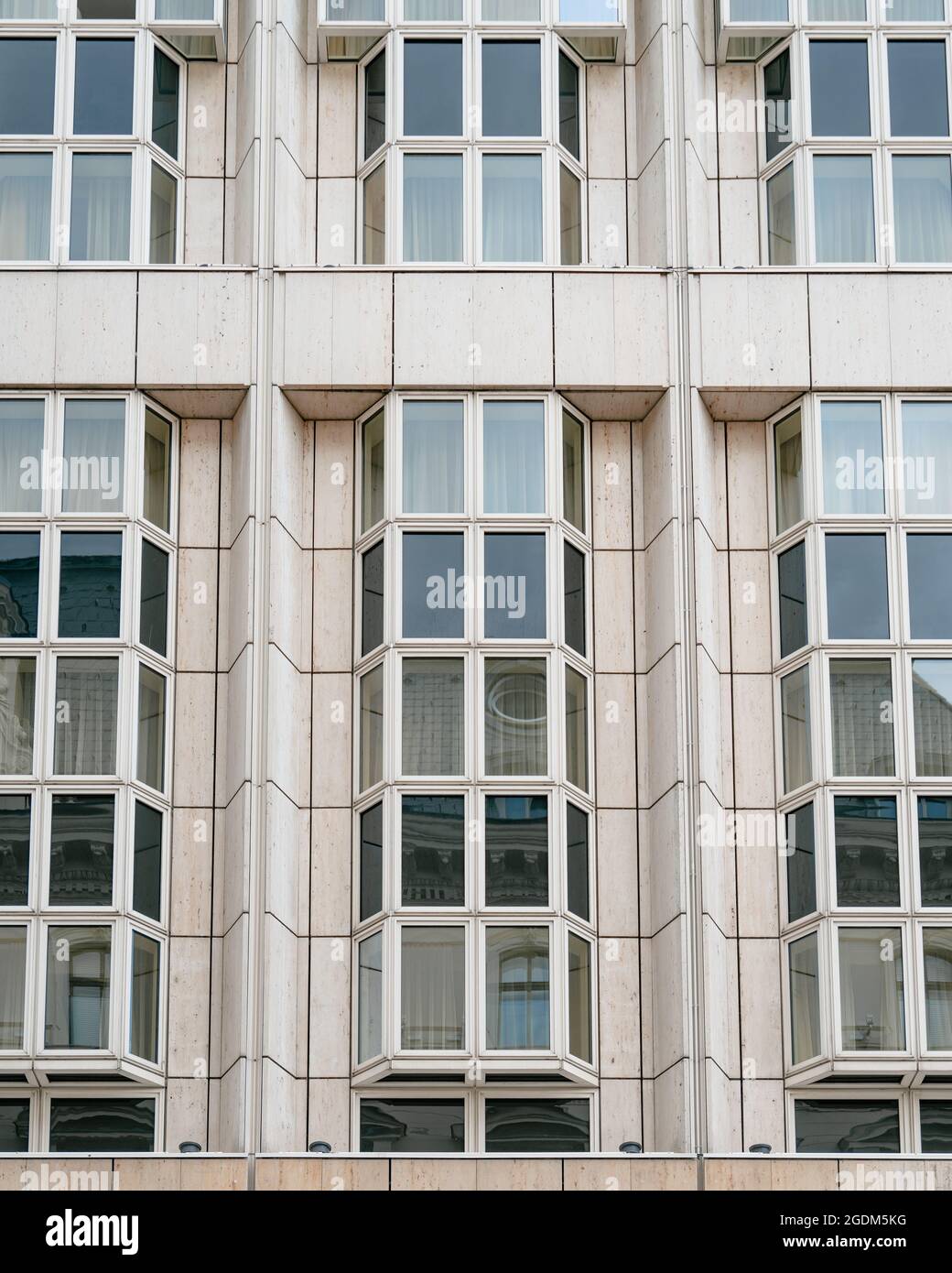 Modern high rise building with glass windows Stock Photo - Alamy