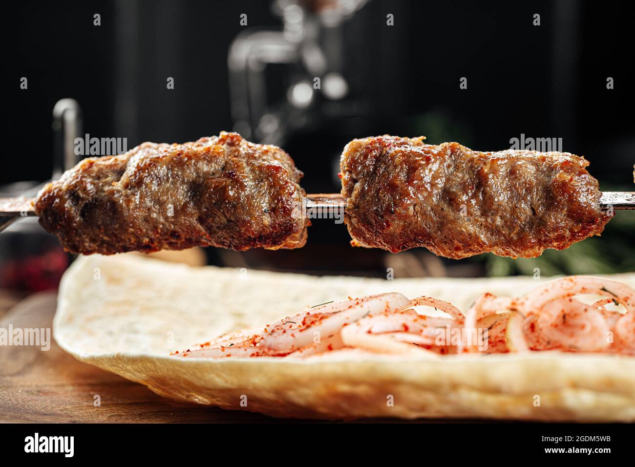 Caucasian beef lyulya kebab with marinated onion Stock Photo - Alamy