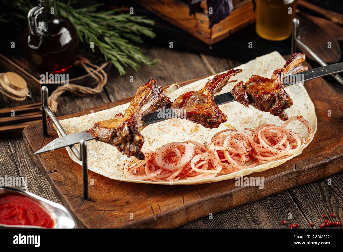 Grilled georgian lamb ribs shashlik skewers Stock Photo - Alamy