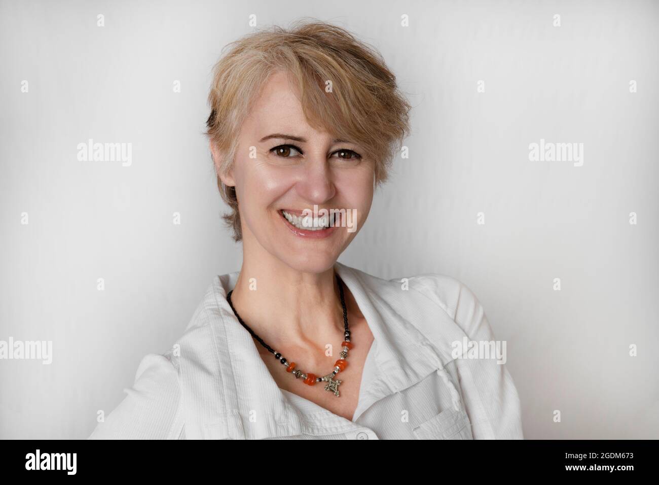 portrait of a smiling 50 year old woman in close-up Stock Photo - Alamy