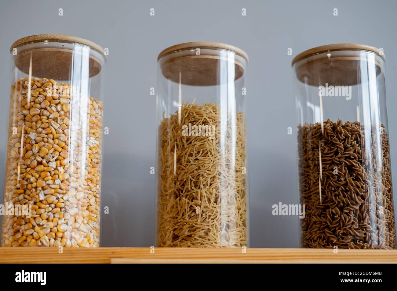 Glass jars with cereals in an eco friendly store. The concept of a ...