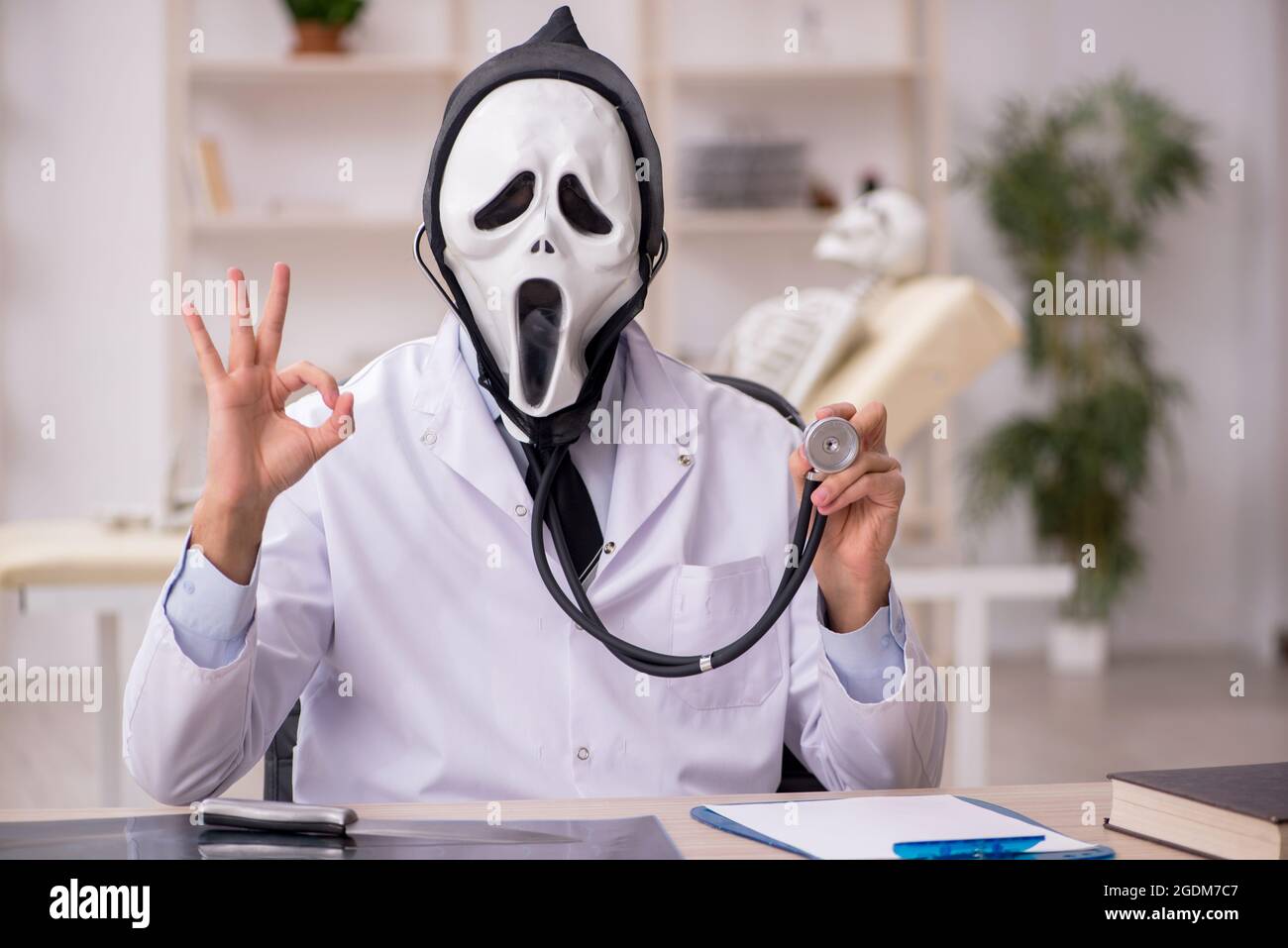 Devil doctor working at the hospital Stock Photo - Alamy