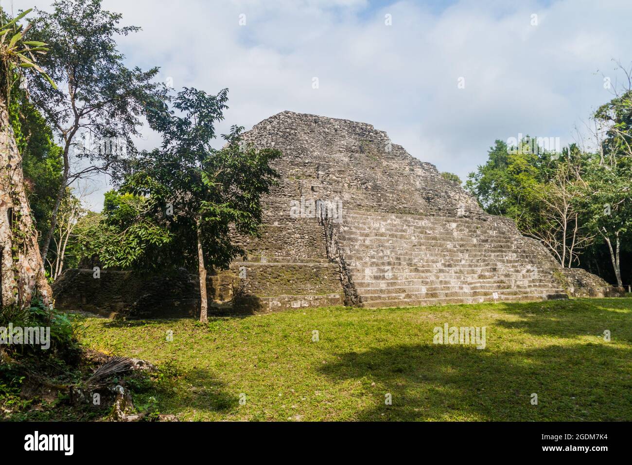 Ruin of a pyramid in an archaeological site Yaxha, Guatemala Stock ...