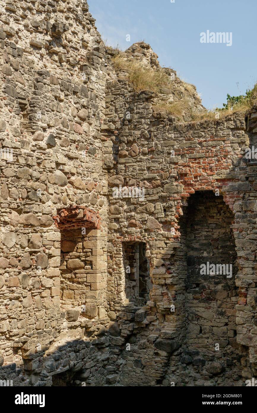 Thousands of years old castle ruins in summer, in the sunlight. Remains ...
