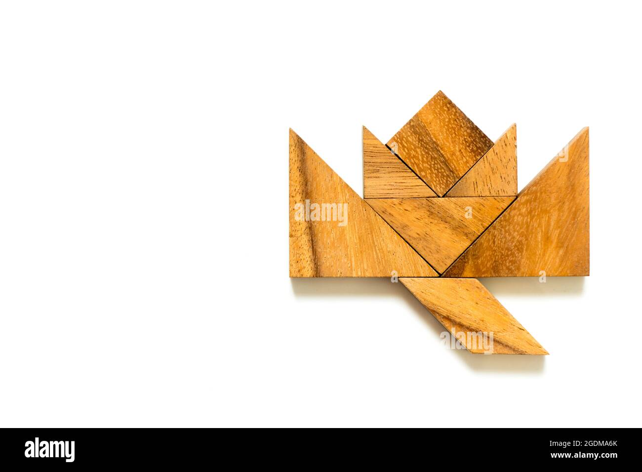 Wood tangram puzzle in blooming flower shape on white background Stock ...