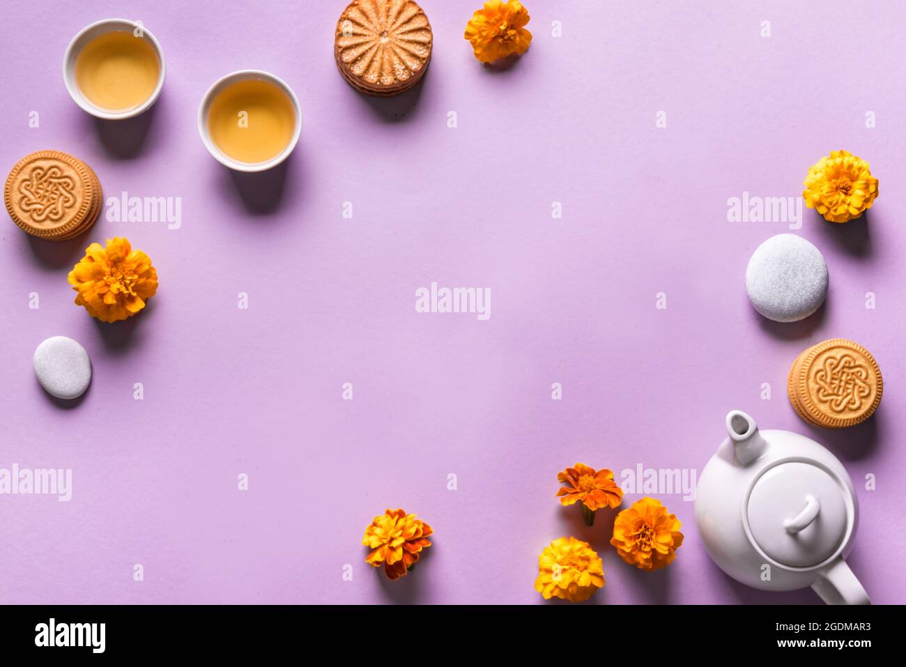 Mid Autumn festival concept. Chinese moon cake, tea and flowers on ...