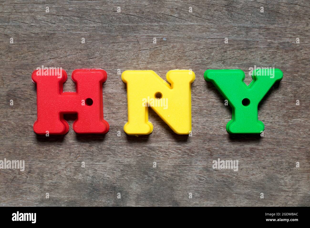 Color alphabet in word HNY (abbreviation of happy new year) on wood ...