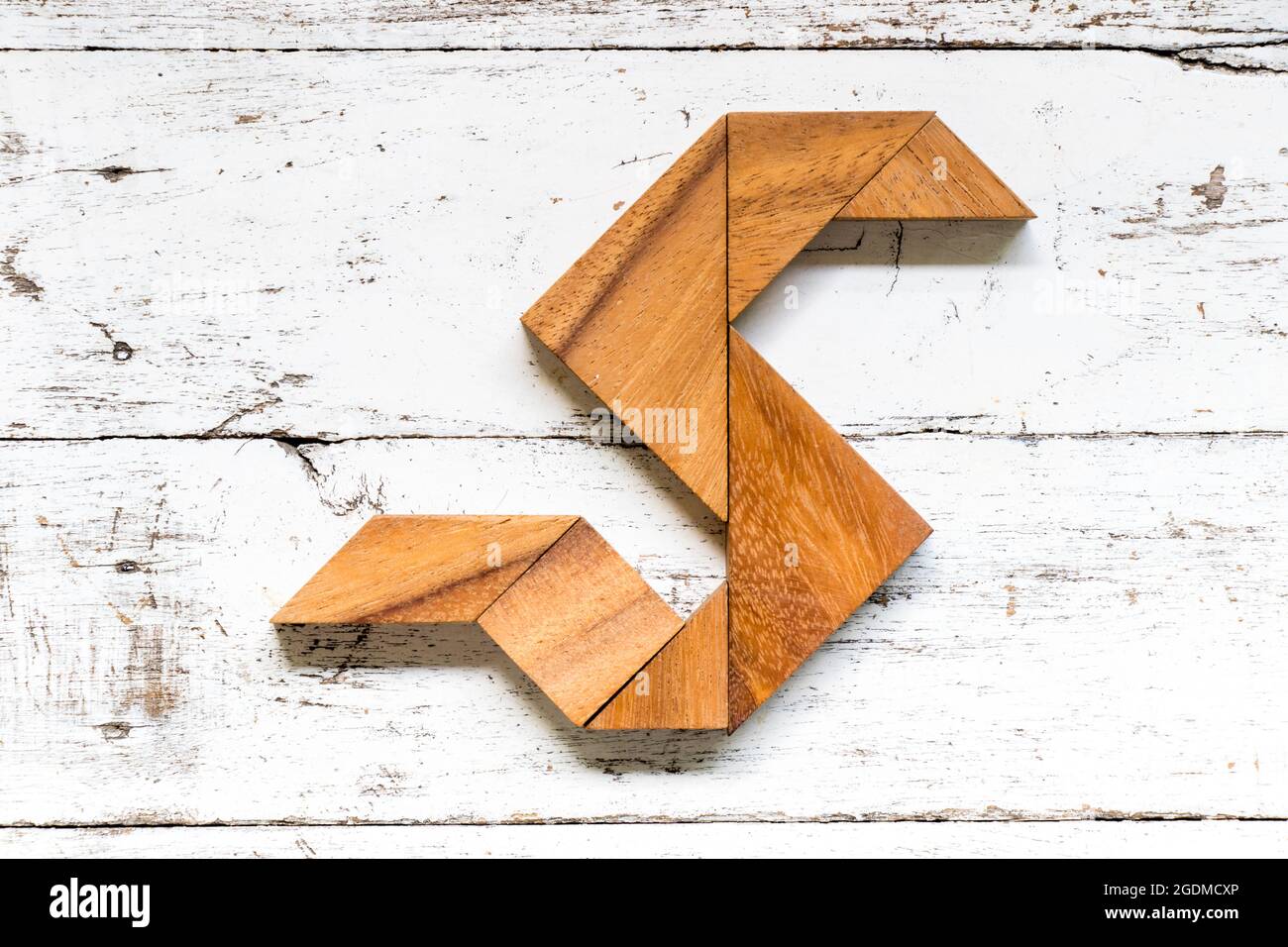 Wood tangram puzzle in sanke or dragon shape on white background Stock ...