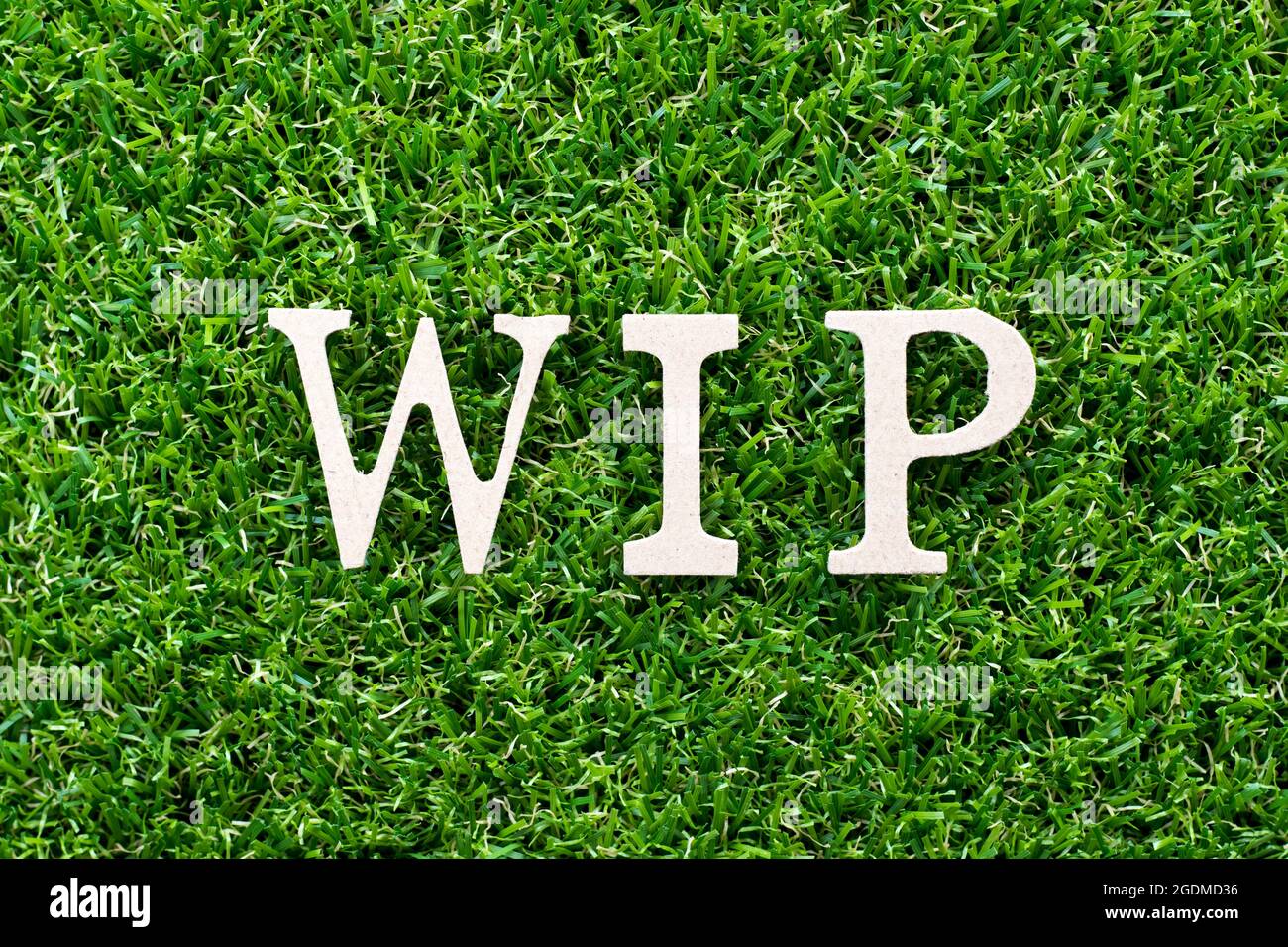 Wood letter in word WIP (Abbreviation of work in progress) on ...