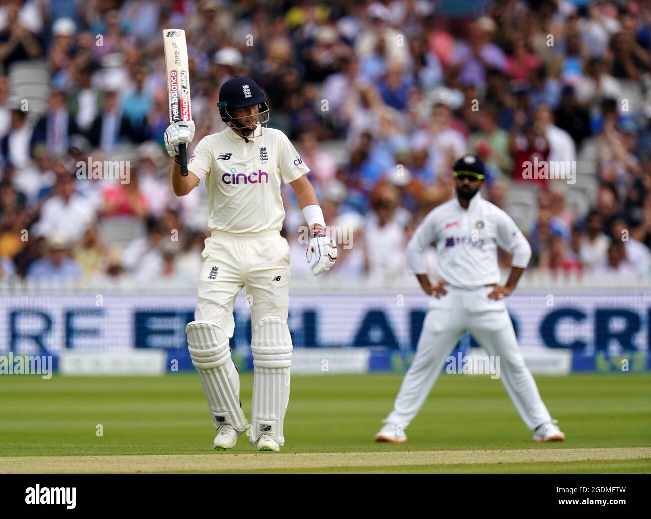 England's Joe Root celebrates his 50 during day three of the cinch ...