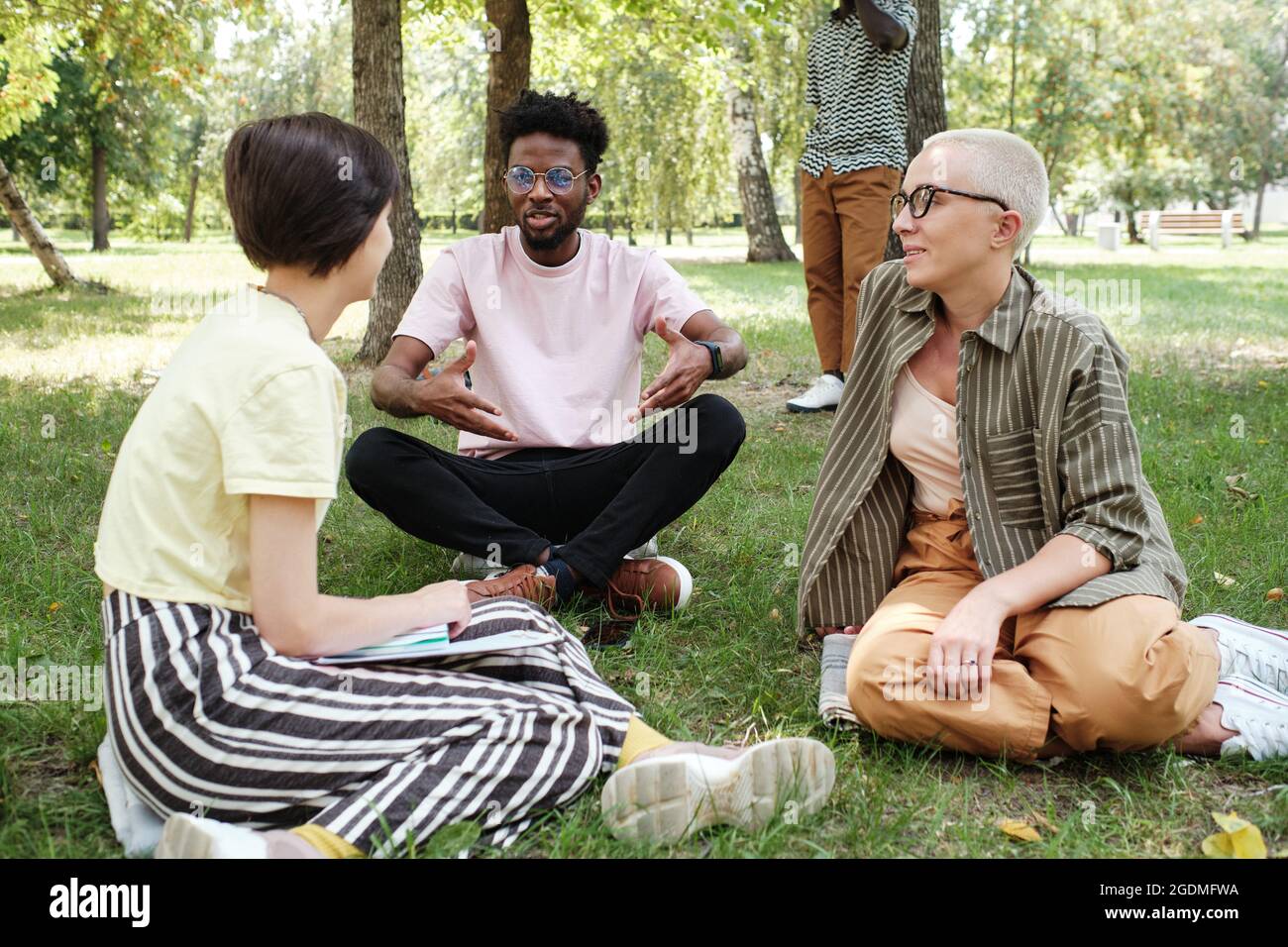 Group people talking camping in hi-res stock photography and images - Alamy